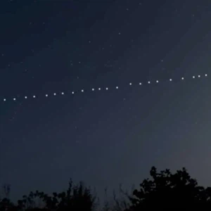 What is the train of lights that appears in the sky in conjunction with ...